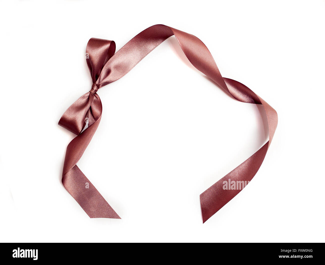 brown ribbon with a bow on white background Stock Photo - Alamy