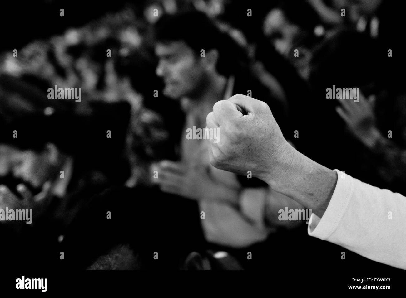 A raised fist of a Christian believer is seen during the religious ...