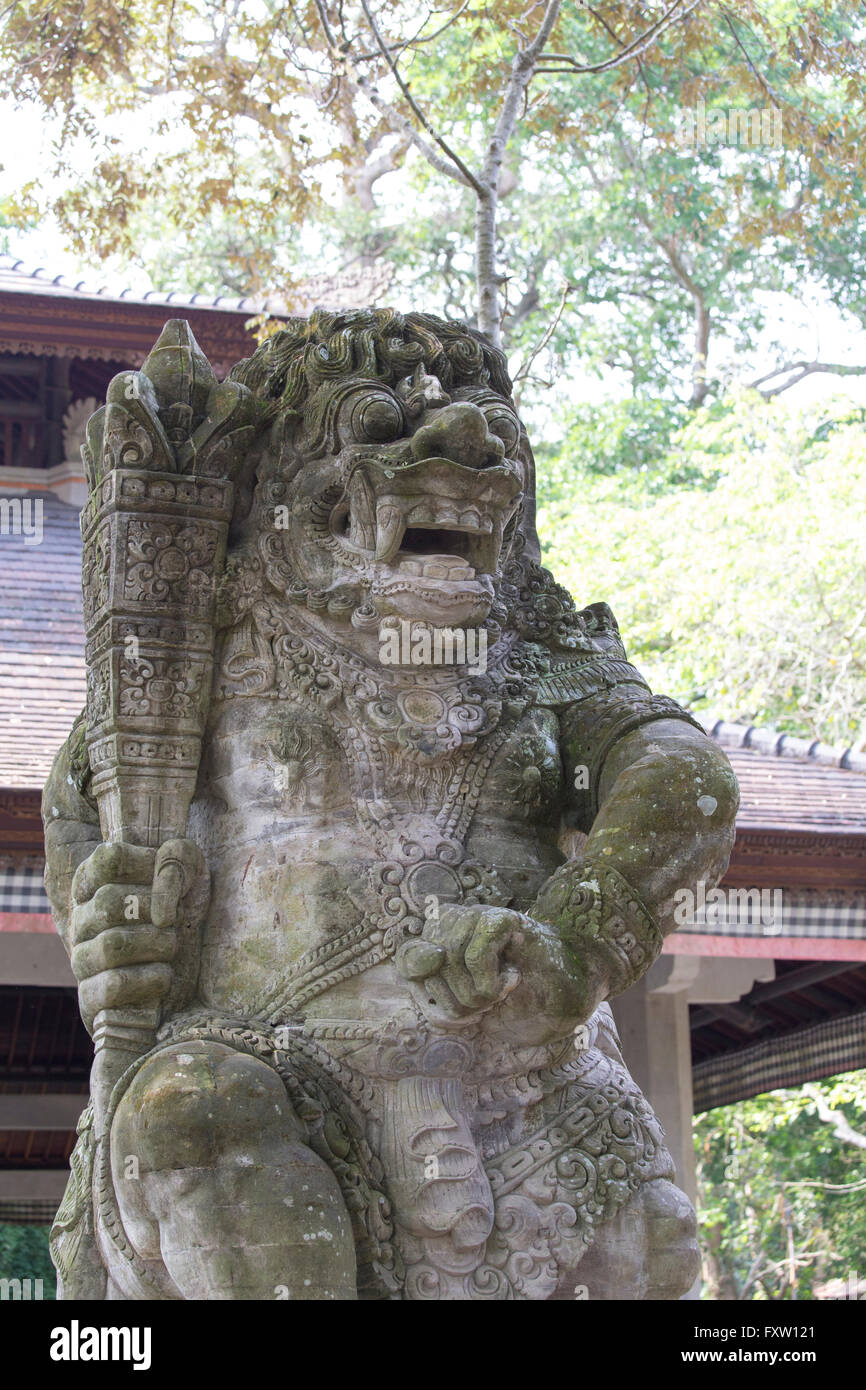 Ancient stone sculpture in the Balinese jungle, Indonesia Stock Photo ...