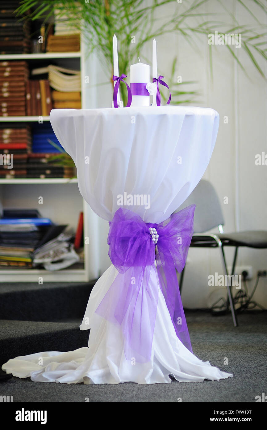 Decorated wedding table with candles, lighting candles for tradition ...