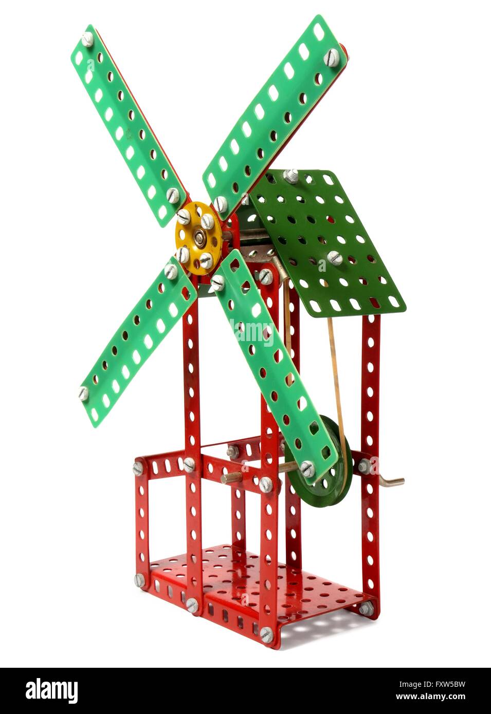 Old metal toy windmill isolated on white background Stock Photo - Alamy