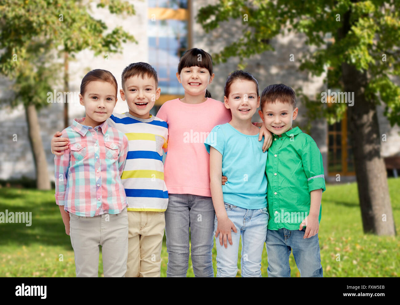 happy smiling little children hugging Stock Photo - Alamy
