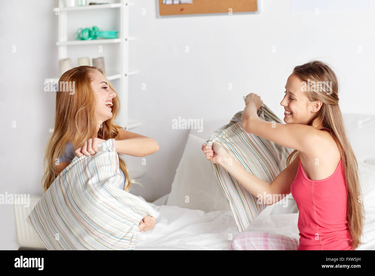 Happy teen girl friends fighting hi-res stock photography and images ...