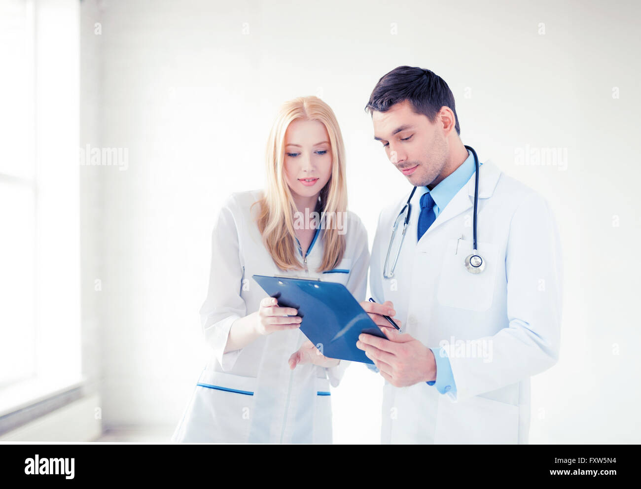 two young attractive doctors Stock Photo - Alamy