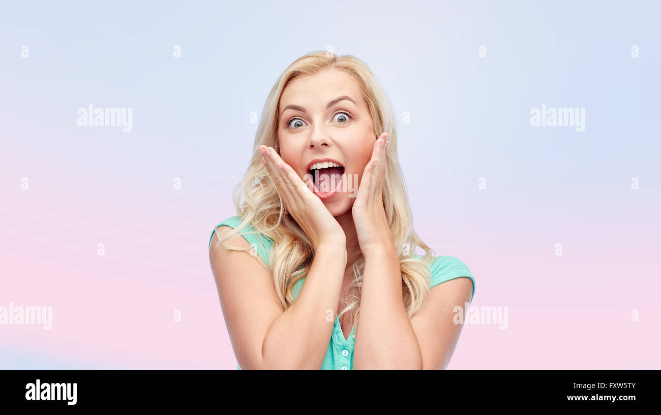 surprised smiling young woman or teenage girl Stock Photo - Alamy