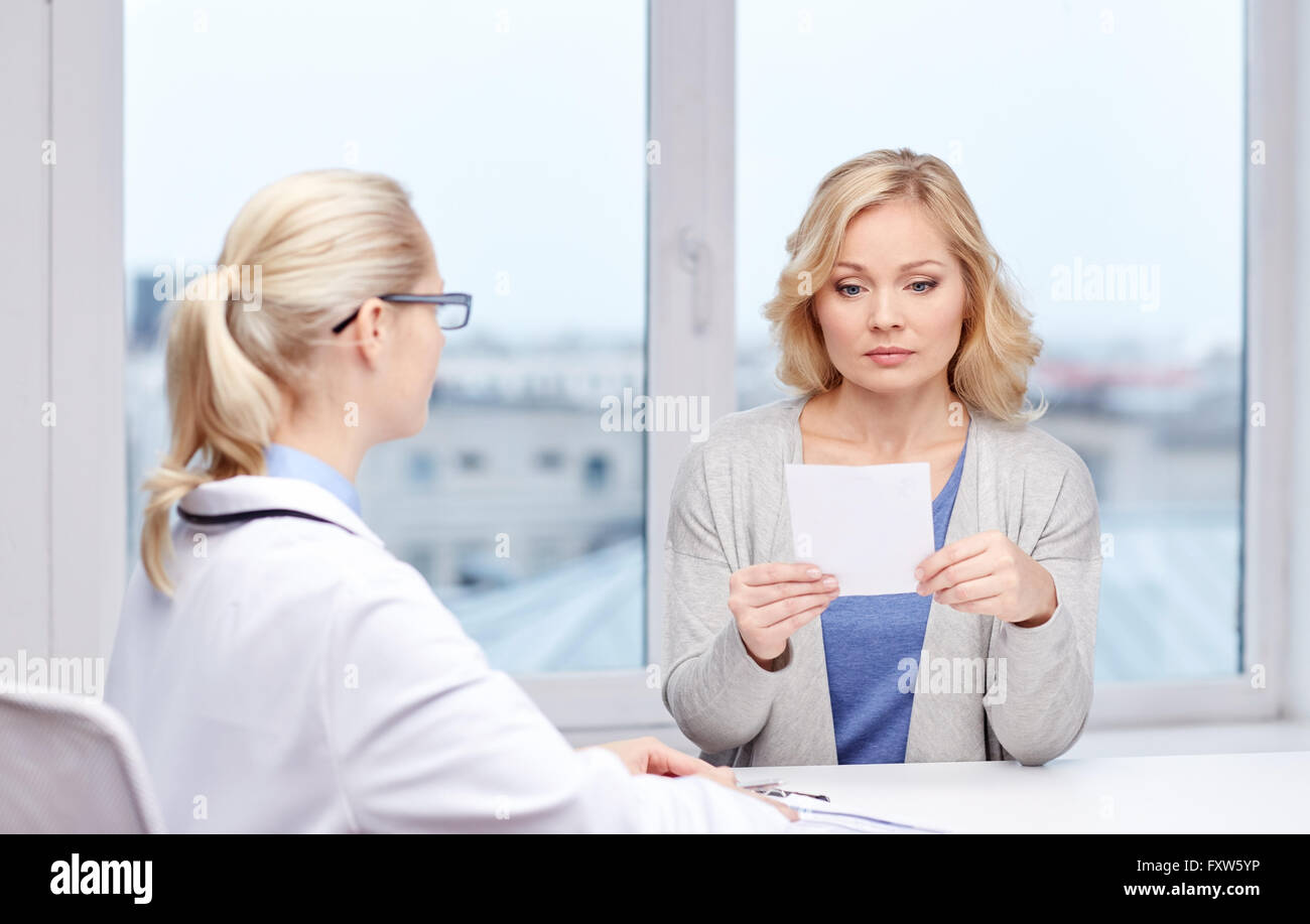 Woman giving treatment sick hi-res stock photography and images - Alamy