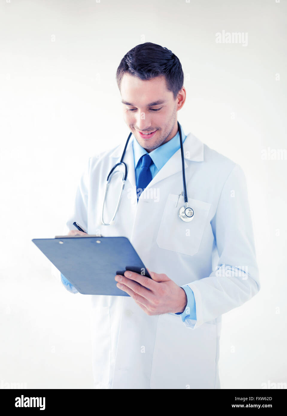 male doctor writing prescription Stock Photo - Alamy