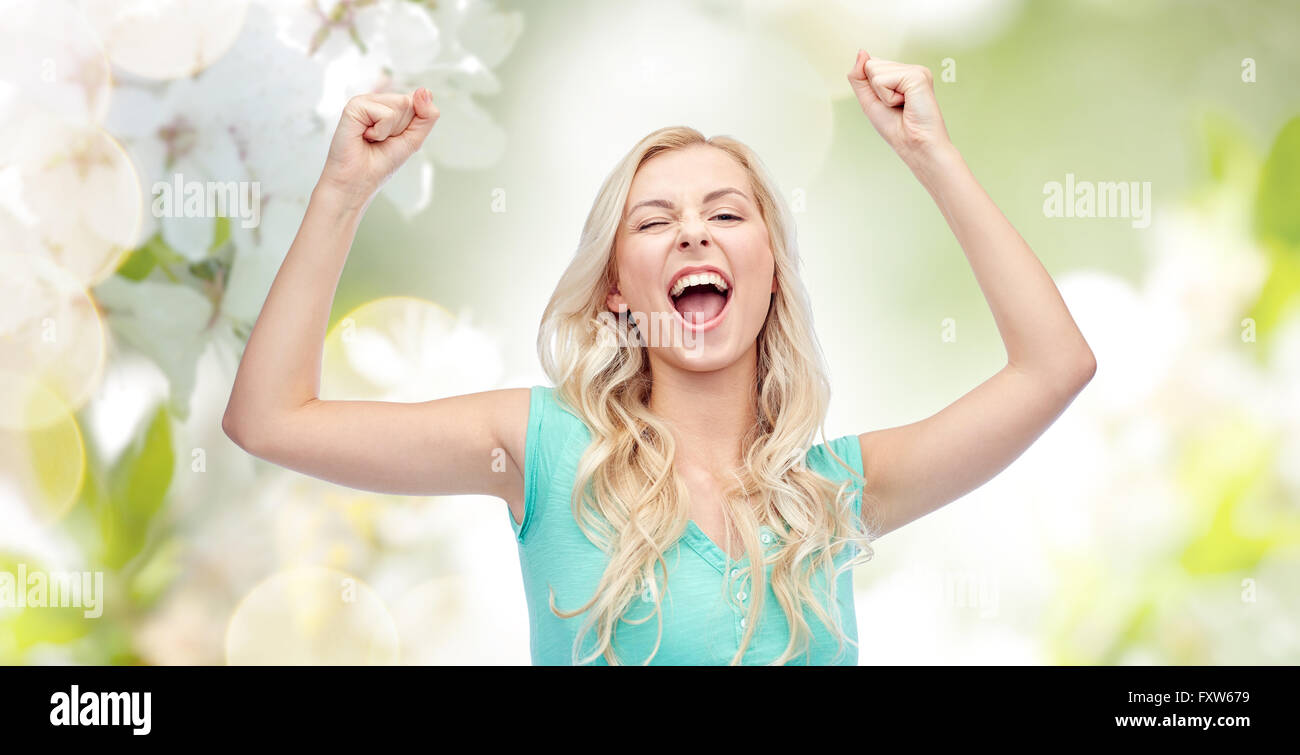 happy young woman or teen girl celebrating victory Stock Photo - Alamy