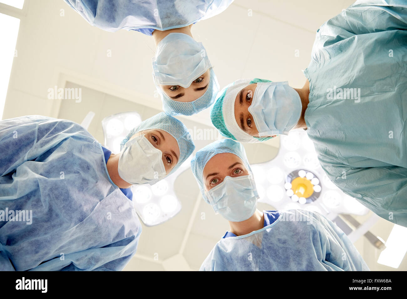 group of surgeons in operating room at hospital Stock Photo - Alamy