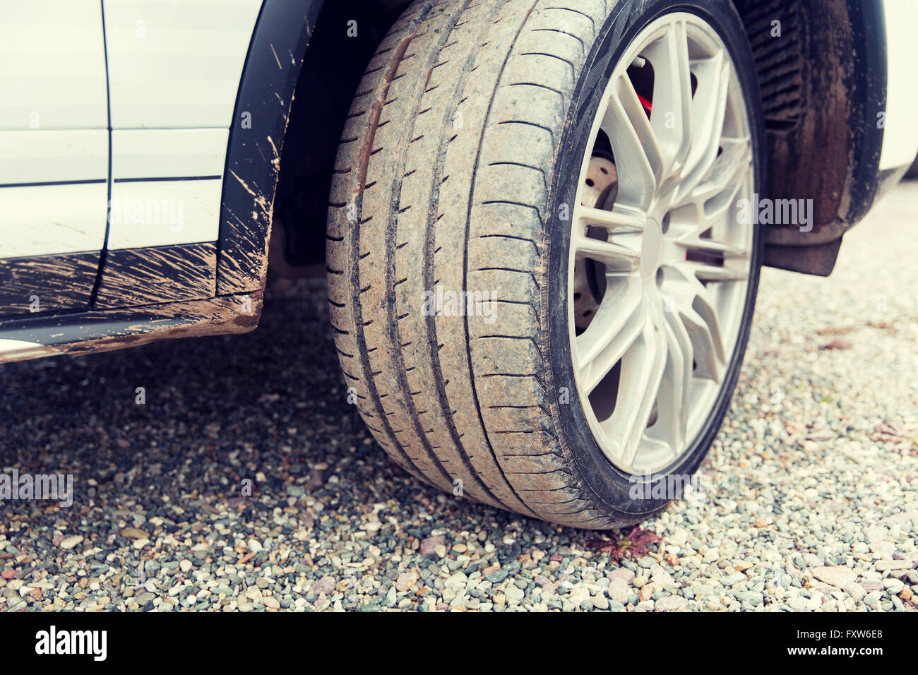 close up of dirty car wheel on ground Stock Photo - Alamy