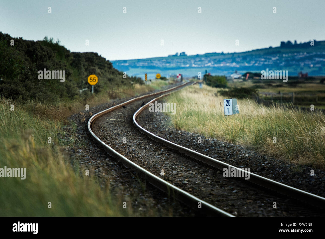 Railway track disappearing into distance through countryside Stock ...