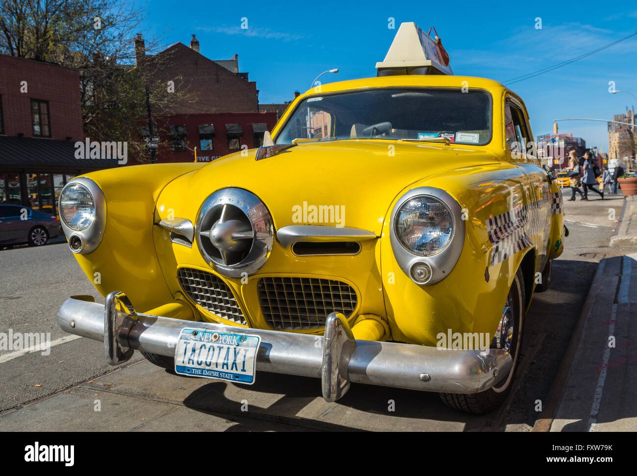 Vintage 1950's era Studebaker yellow taxi cab advertising the Caliente ...