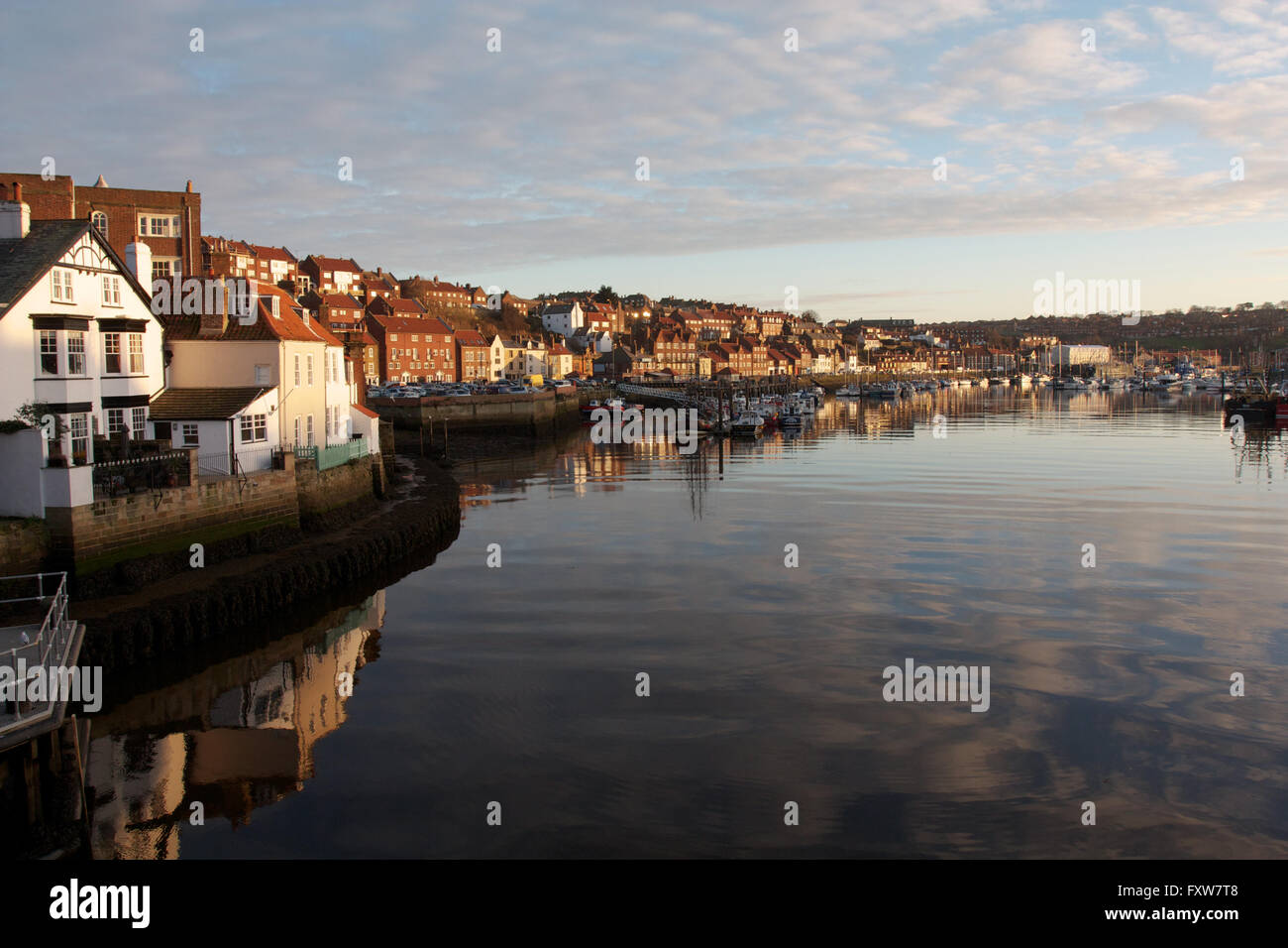 Whitby Harbour taken from the old swing bridge on late winter's evening ...
