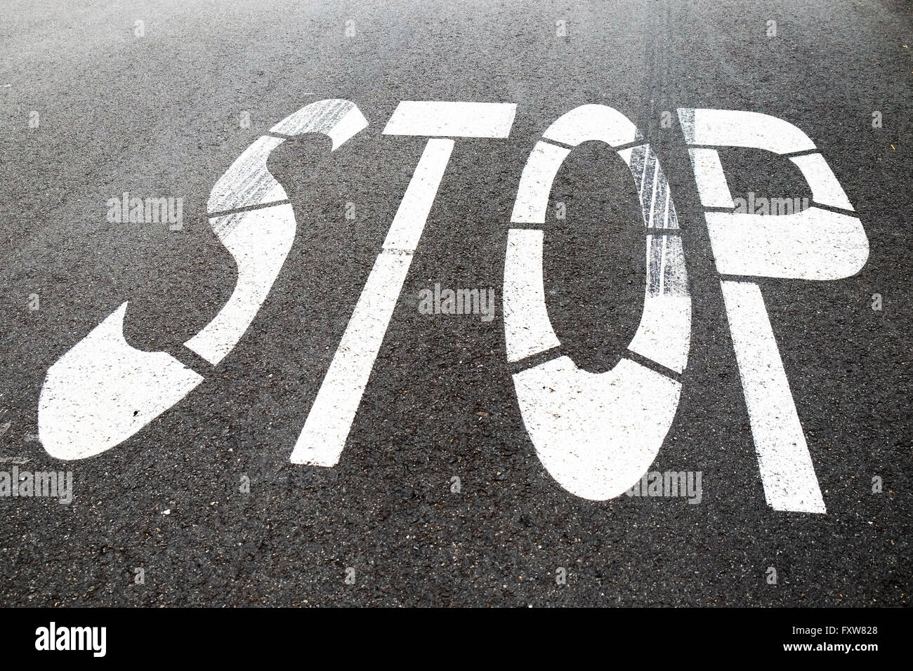 Stop marking on pavement hi-res stock photography and images - Alamy
