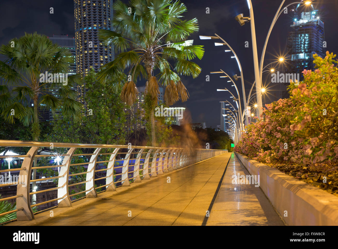 night well illuminated pathway in Singapore along Esplanade drive Stock ...