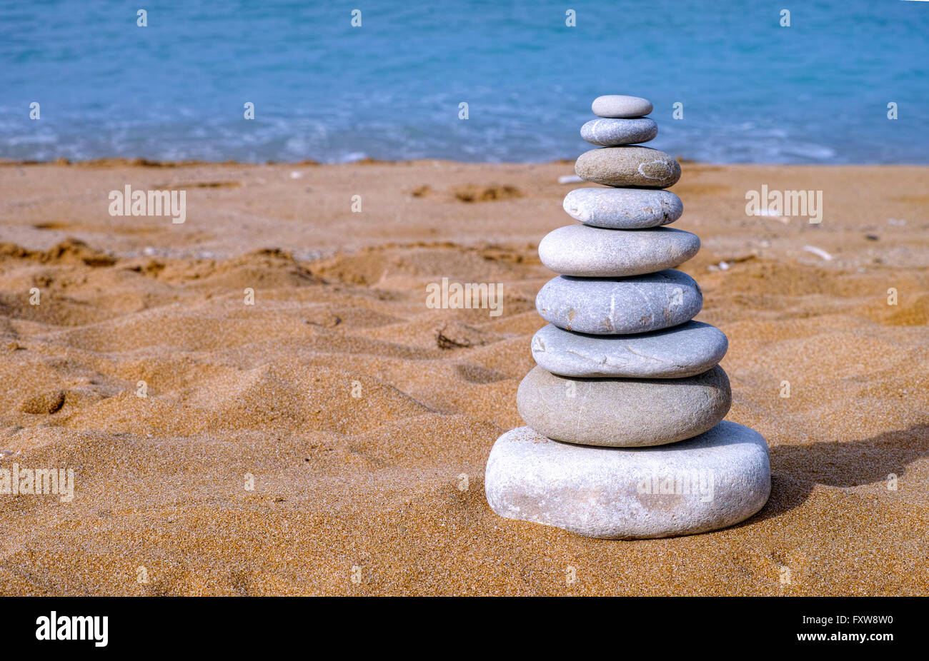 Stack of stones on the sea beach Stock Photo - Alamy