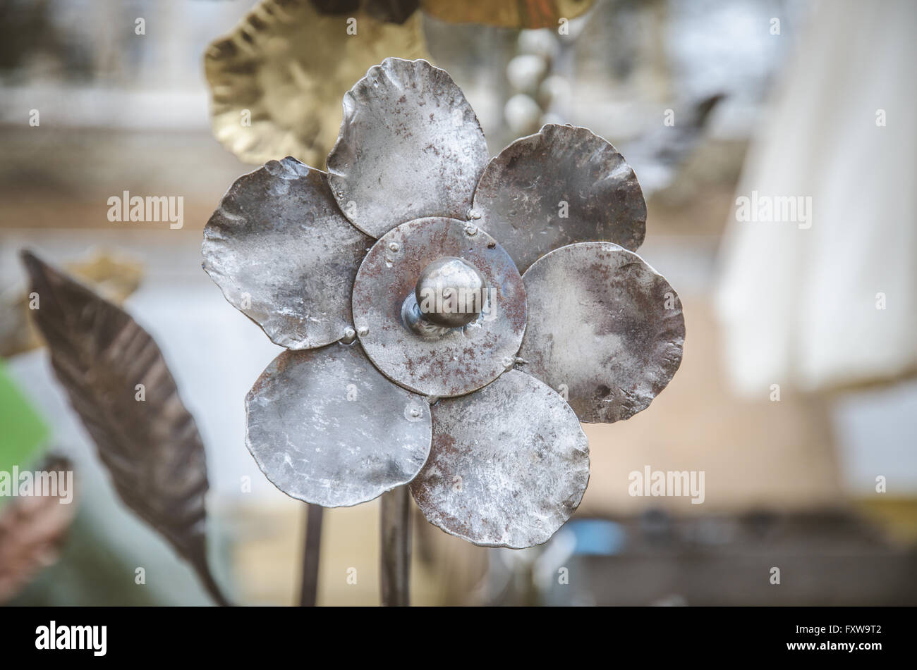 silver metal decorative art flower Stock Photo - Alamy