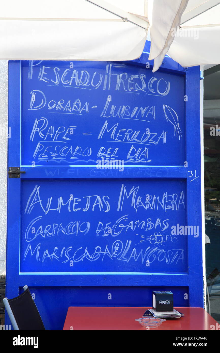 Harbour cafe menu, with fresh fish, in picturesque Cadaques, Catalonia ...