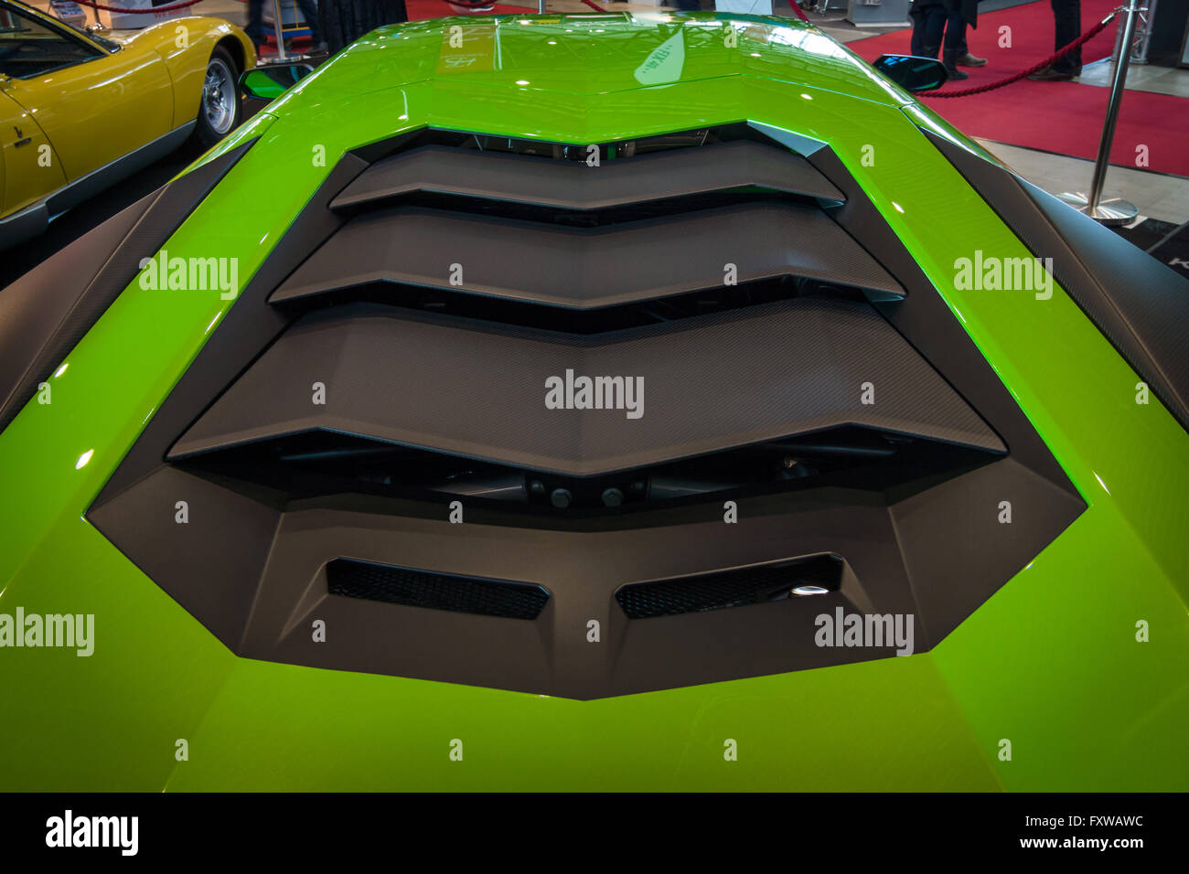 The engine compartment of mid-engined sports car Lamborghini Aventador ...