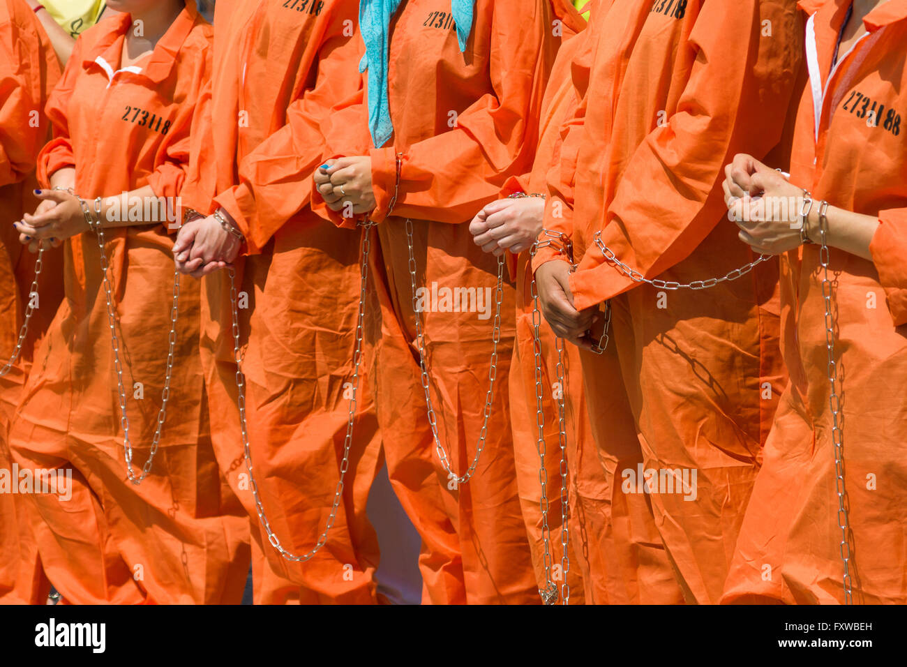 Amnesty International activists protest at Potsdamer Platz near the ...