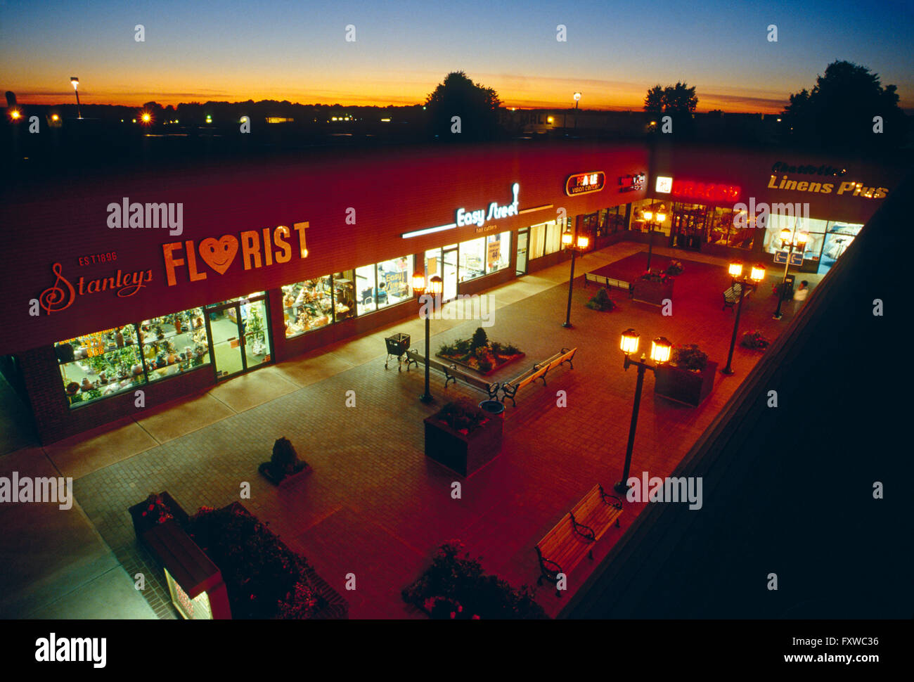 Aerial view of large strip shopping mall at sunset; central New Jersey ...