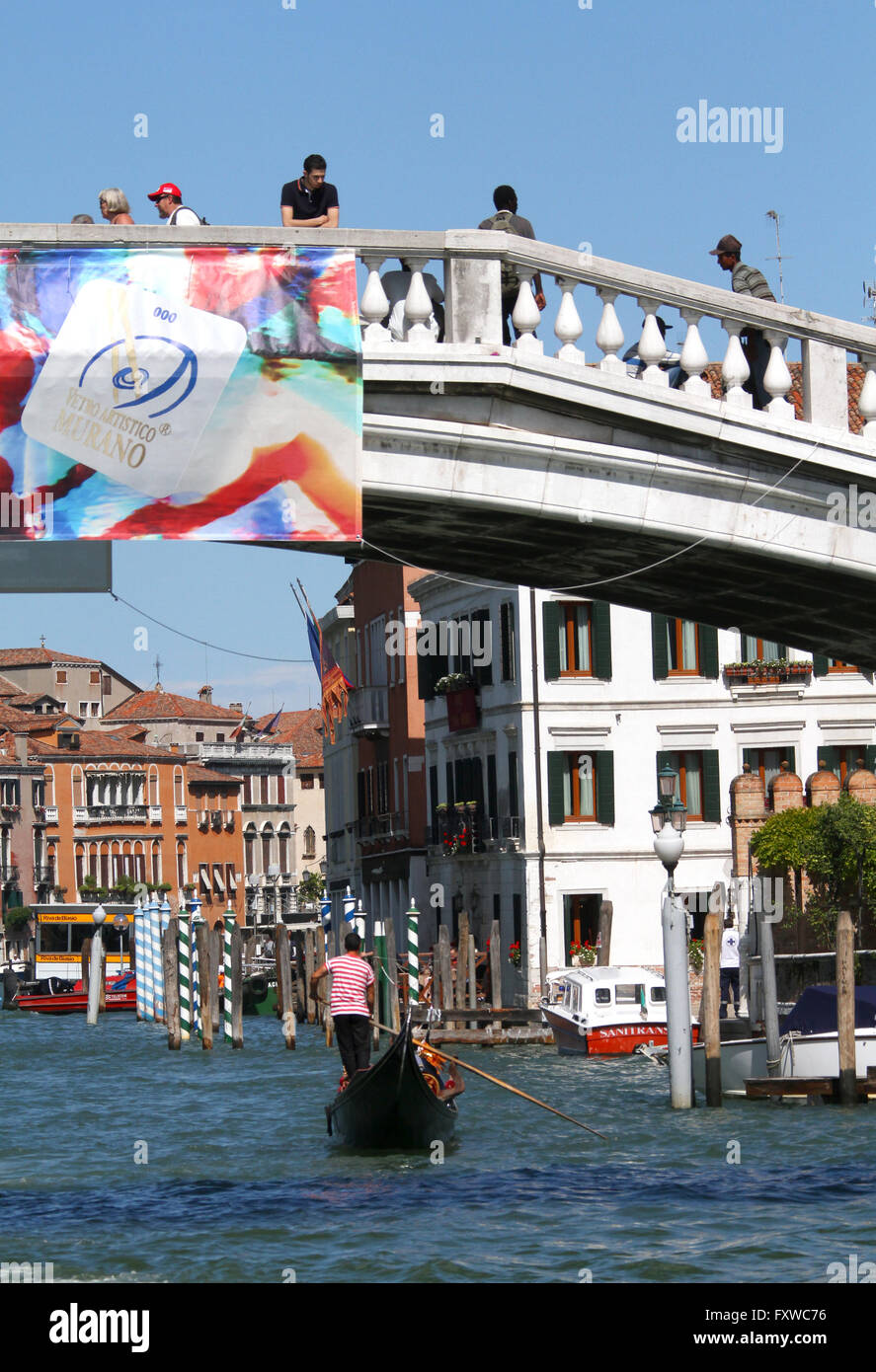 Gondola on canal with tourists hi-res stock photography and images - Alamy