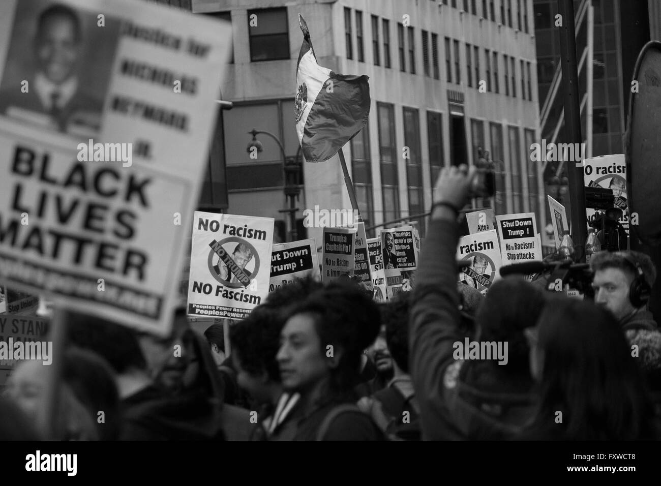 Viva Mexico- A Mexican flag unfurls during an anti-Trump rally during ...