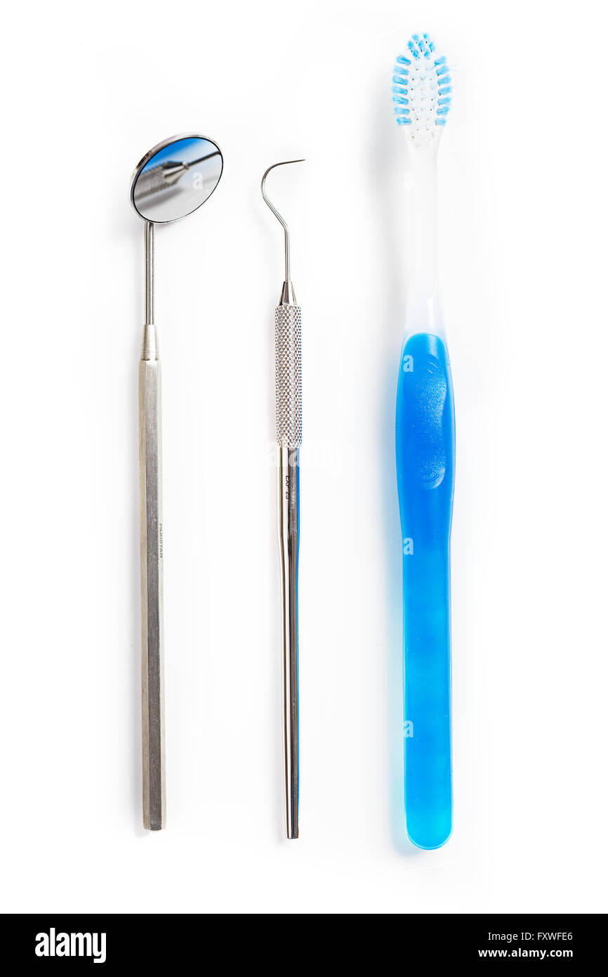 Variety of tools from a dentist's office Stock Photo - Alamy