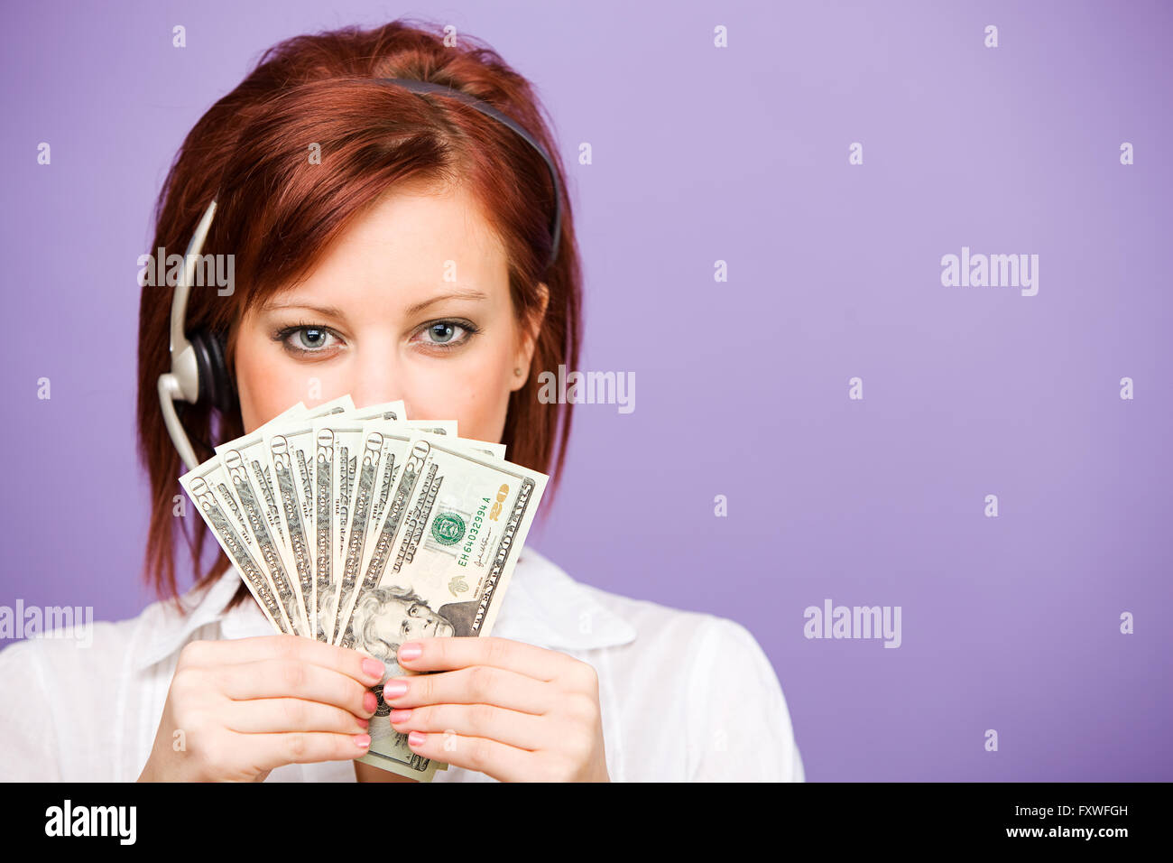 Pretty female as customer service representative Stock Photo - Alamy