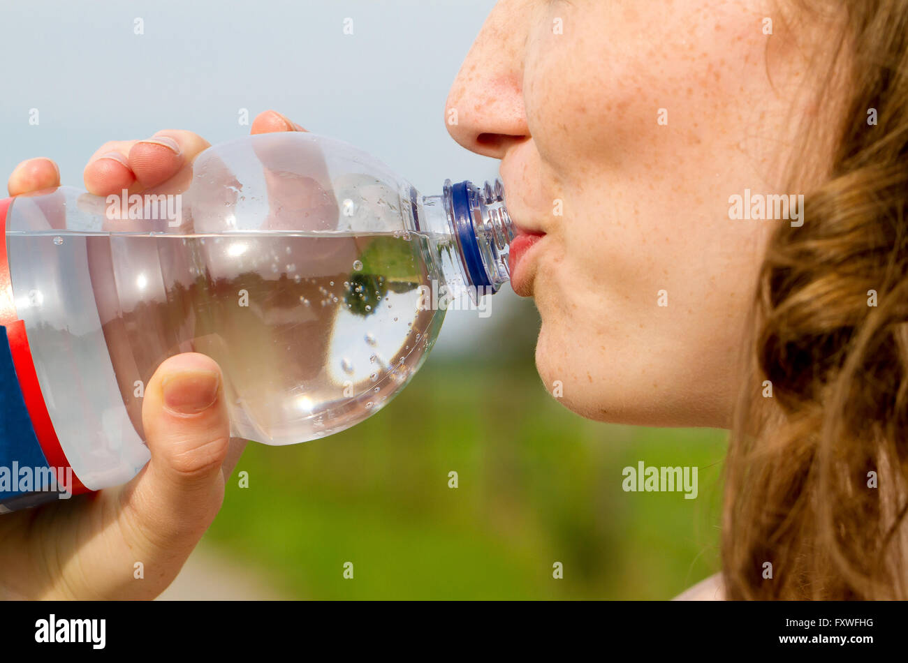 Face drink water woman hi-res stock photography and images - Alamy