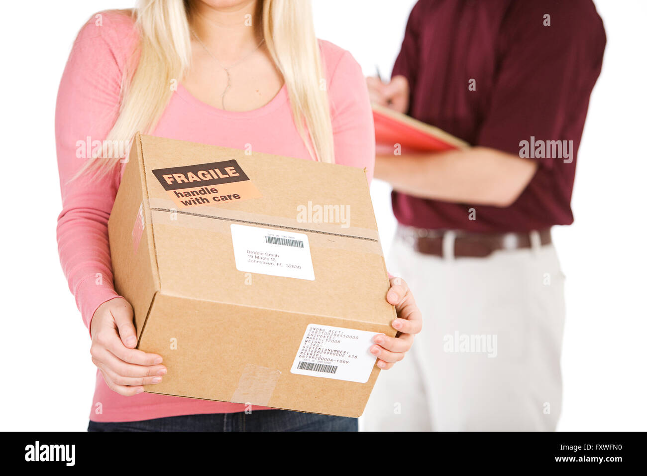 Shipping company employee, isolated on white, with boxes Stock Photo ...