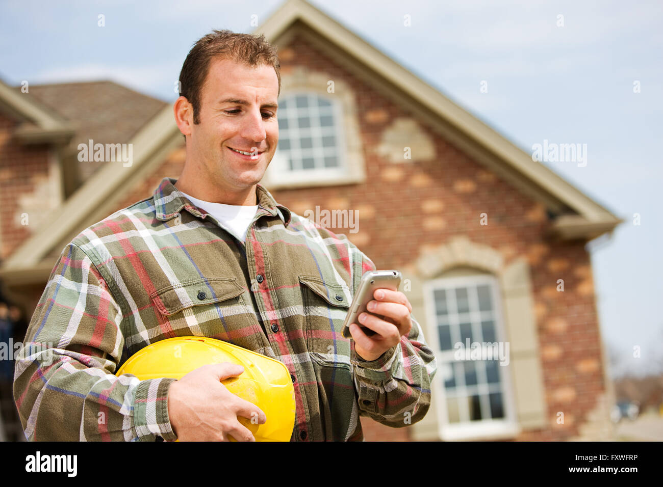 Series at a new home construction site. Includes construction worker ...