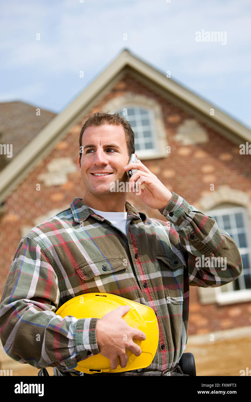 Series at a new home construction site. Includes construction worker ...
