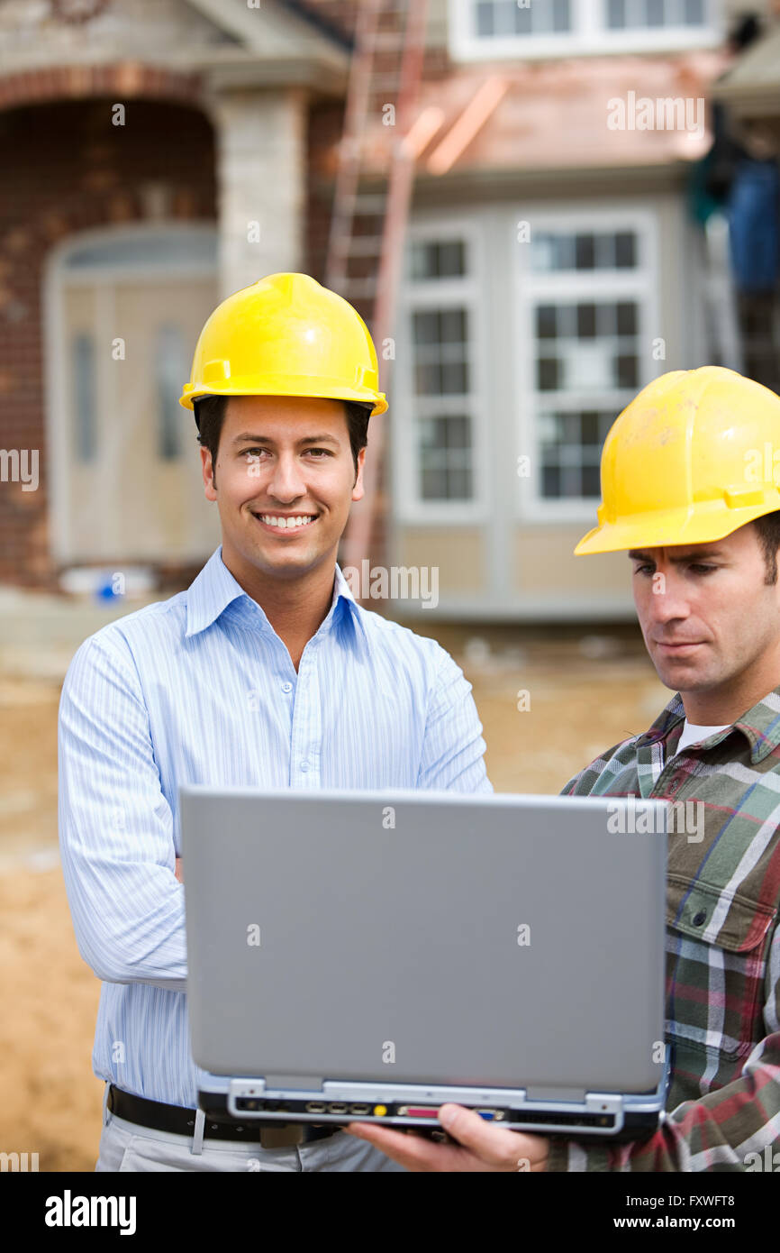 Series at a new home construction site. Includes construction worker ...