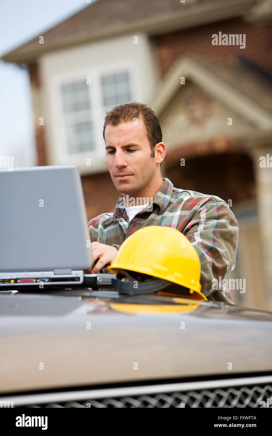 Series at a new home construction site. Includes construction worker ...