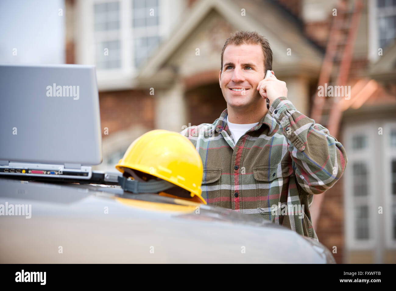 Series at a new home construction site. Includes construction worker ...