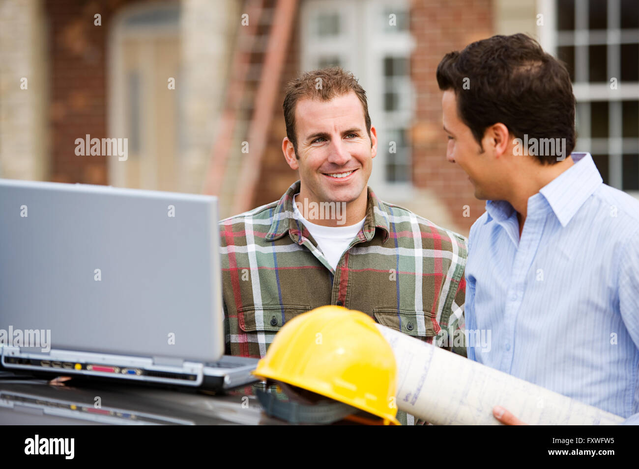 Series at a new home construction site. Includes construction worker ...