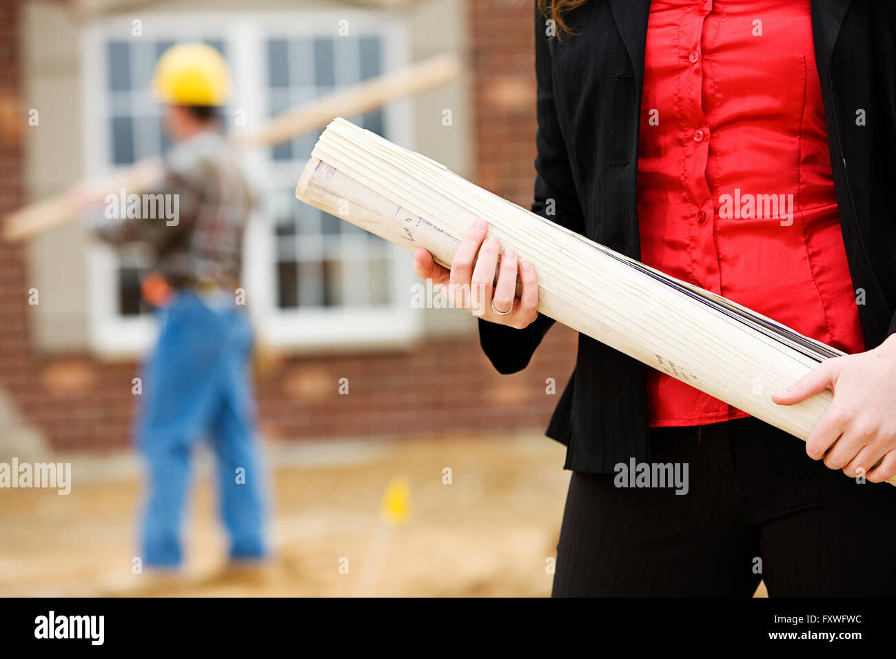 Series at a new home construction site. Includes construction worker ...