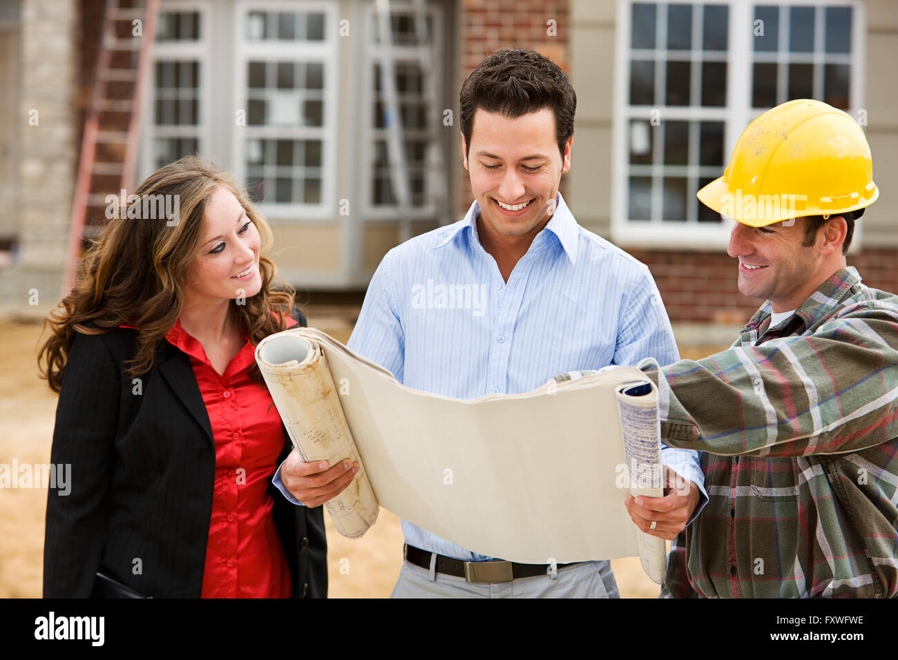 Series at a new home construction site. Includes construction worker ...
