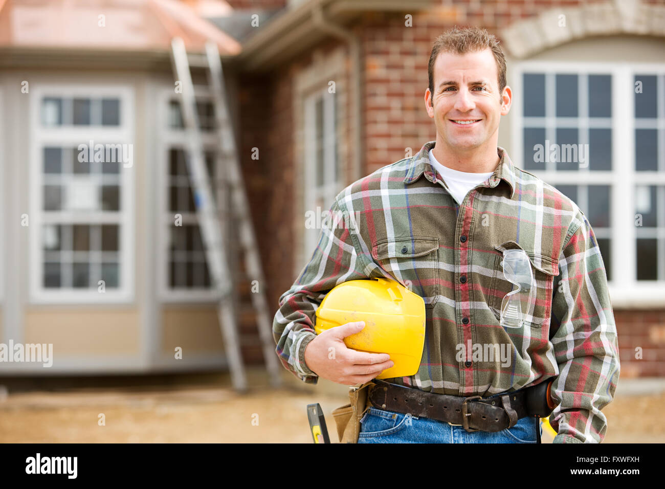 Series at a new home construction site. Includes construction worker ...