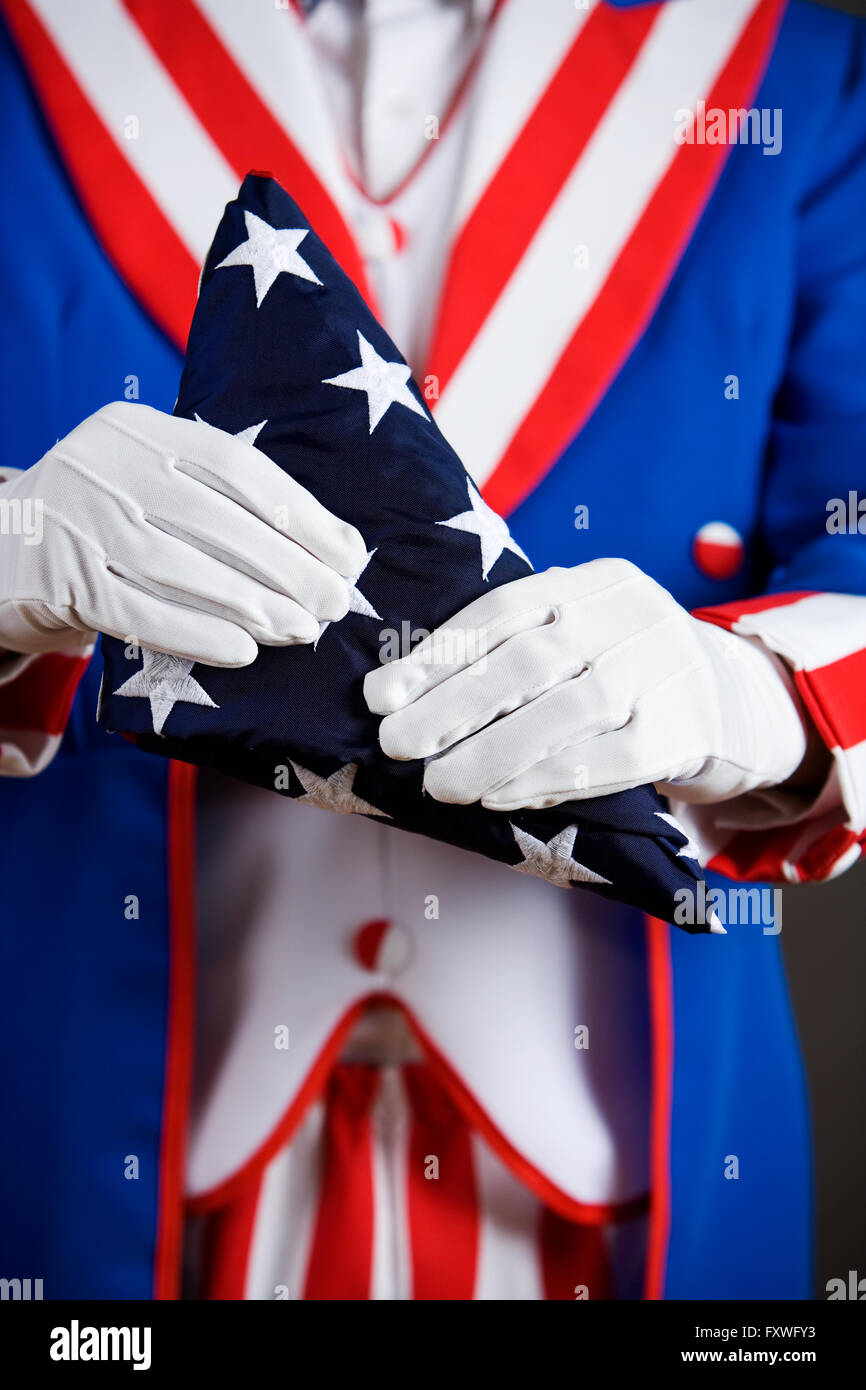 Uncle Sam patriotic series with man holding variety of props Stock ...