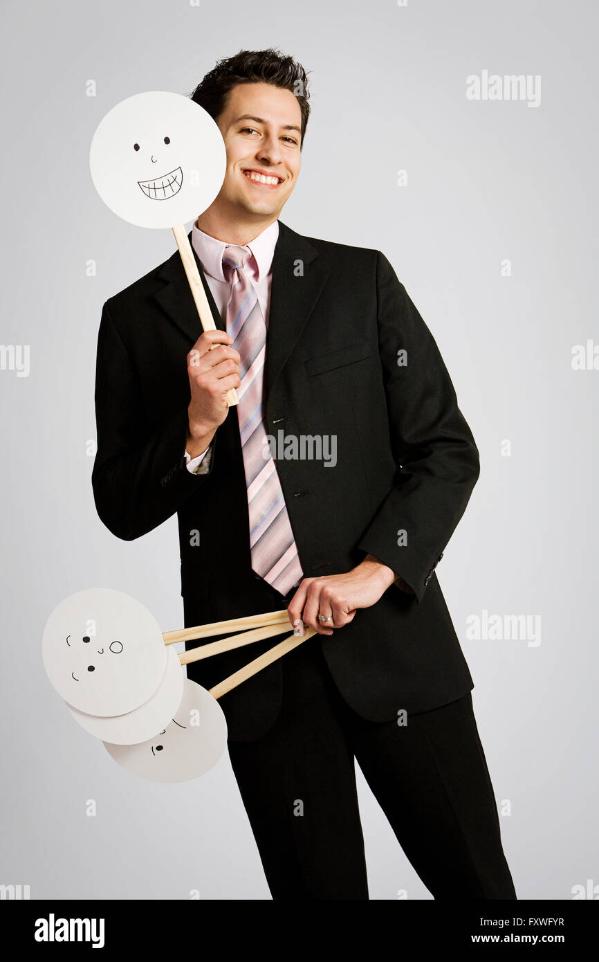 Face peeking behind mask hi-res stock photography and images - Alamy