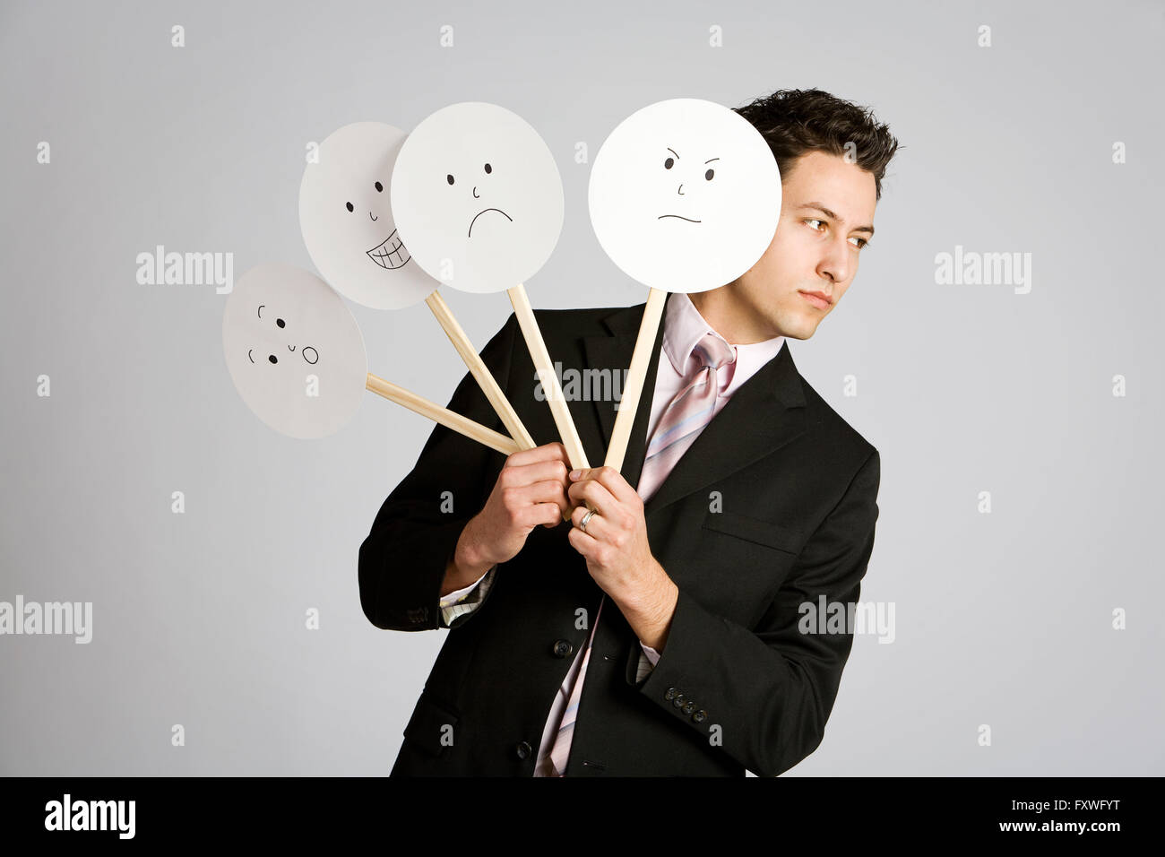 Face peeking behind mask hi-res stock photography and images - Alamy