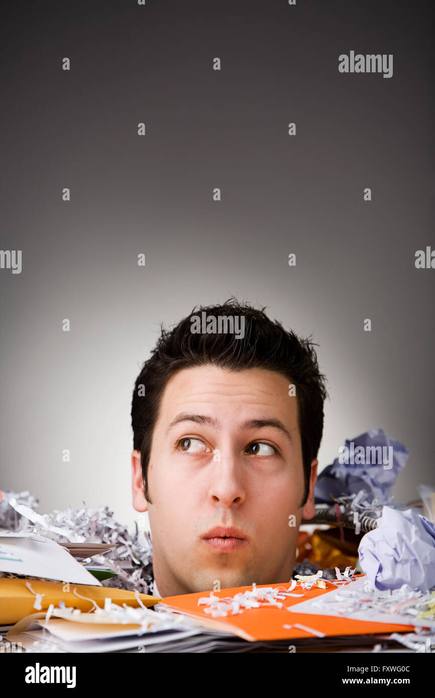 Series with a businessman overwhelmed and buried by work Stock Photo ...