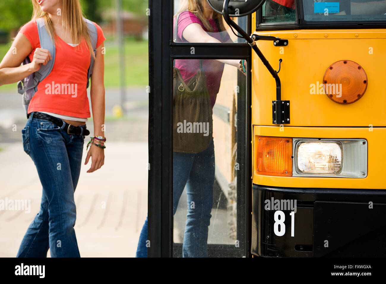 Students boarding bus hi-res stock photography and images - Alamy