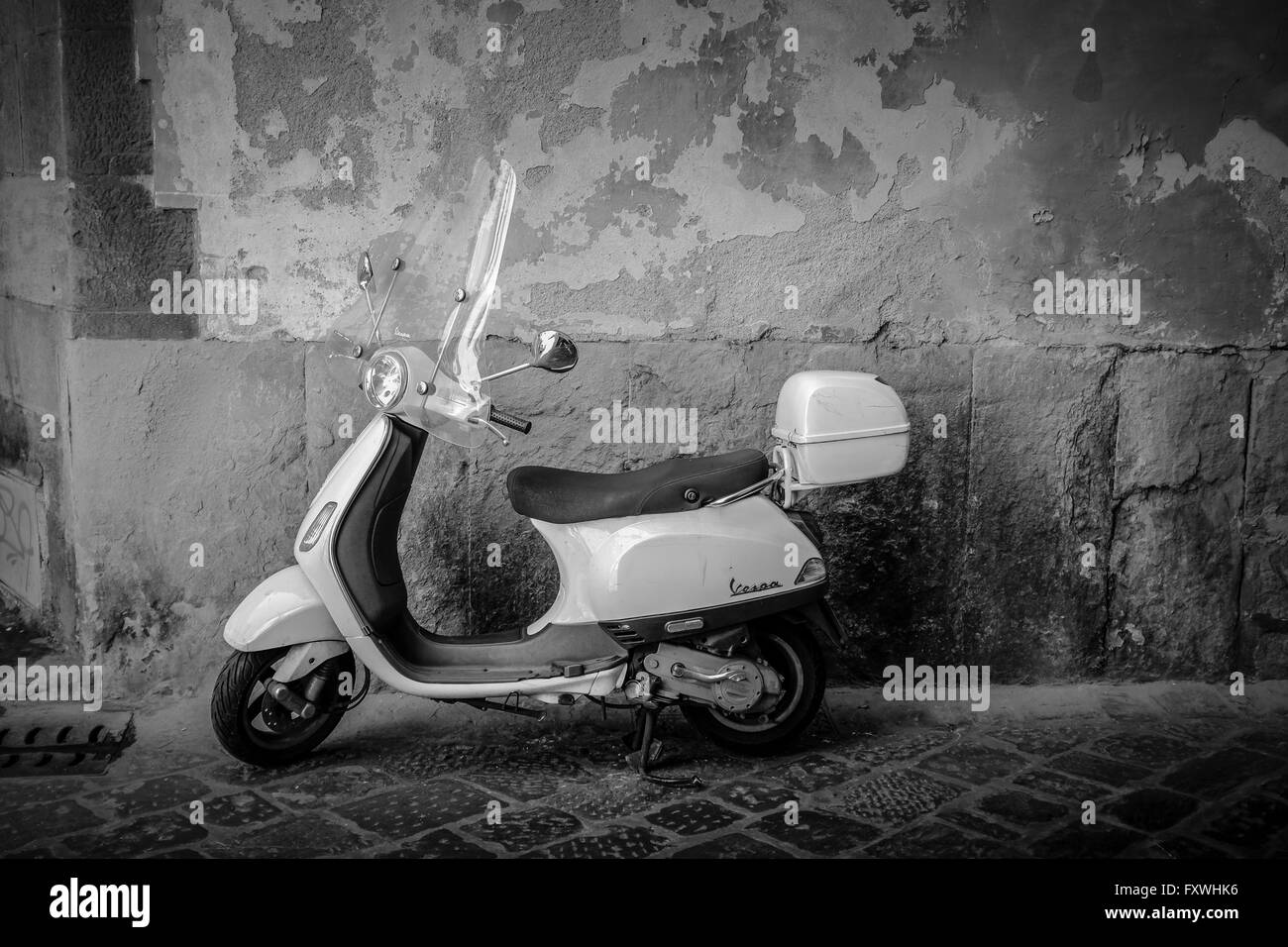A Vespa motor scooter on the streets of Rome, Italy Stock Photo - Alamy