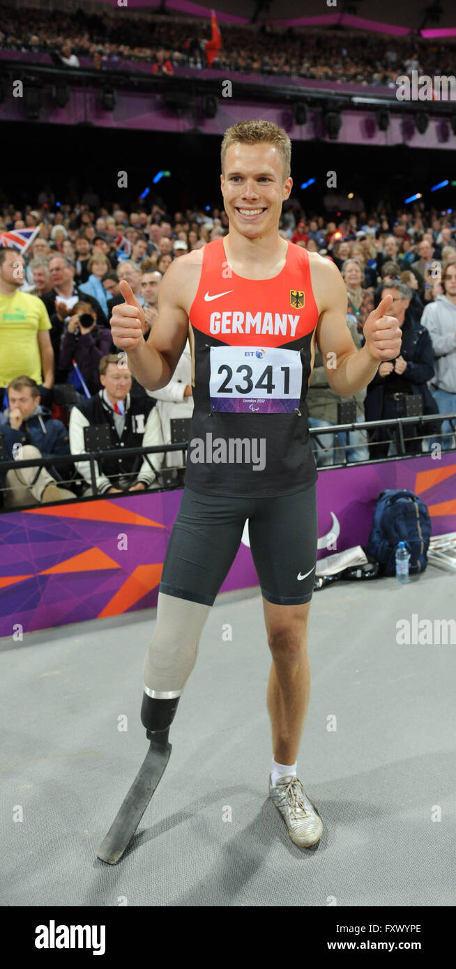 Gold medalist Markus Rehm of Germany celebrates after the men's long ...