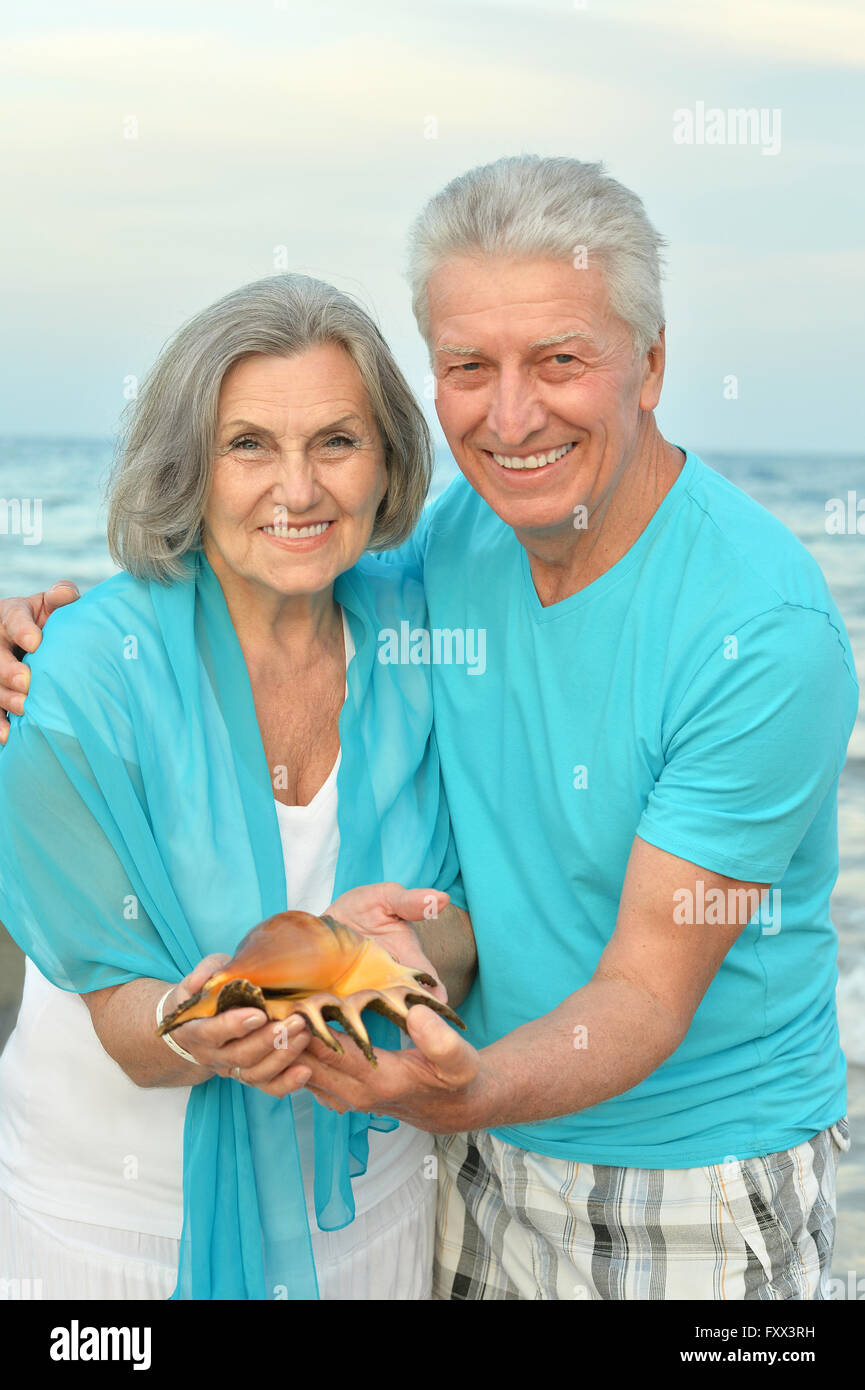 elderly couple rest at tropical resort Stock Photo - Alamy