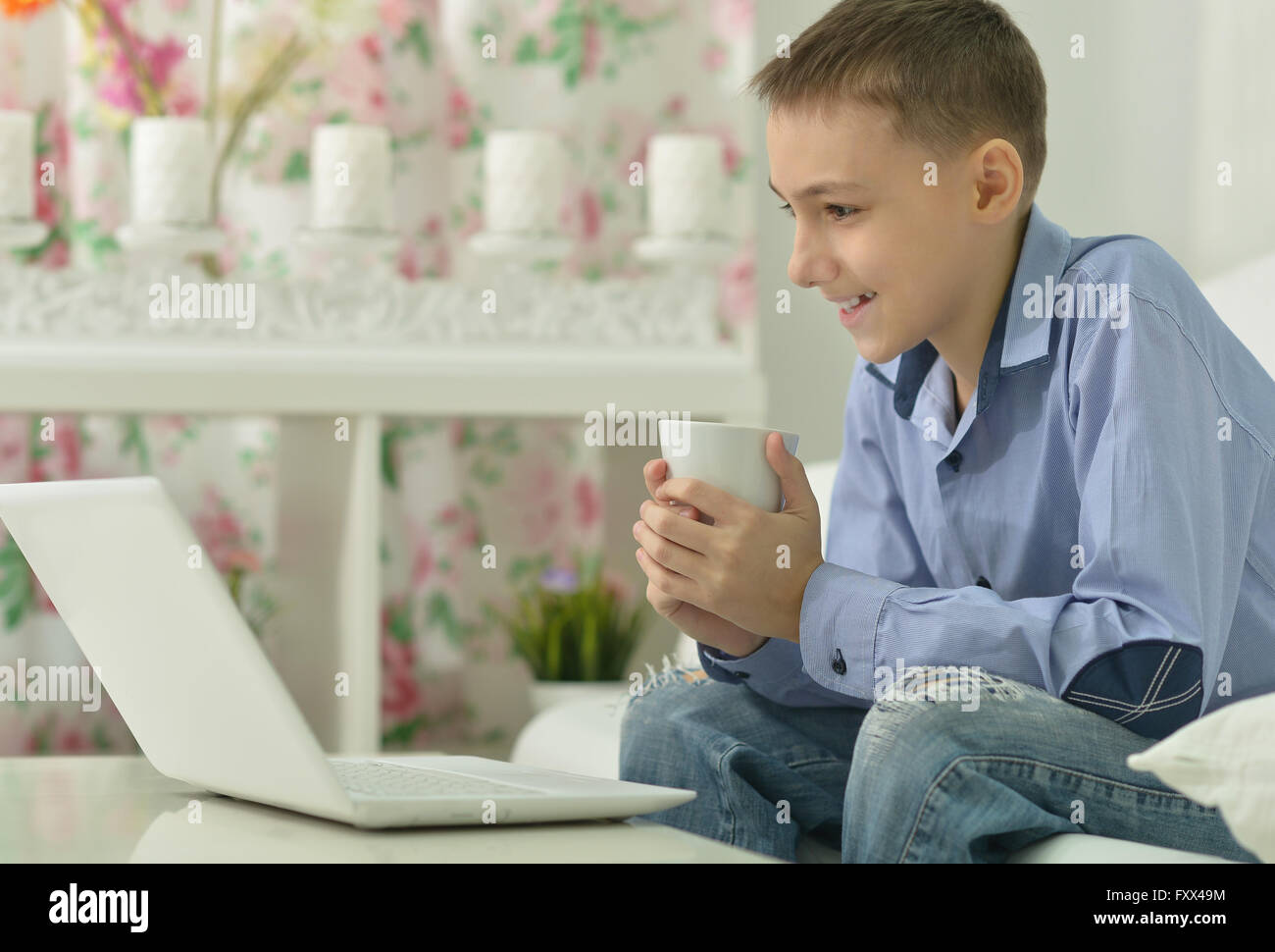 Young boy and laptop computer Stock Photo - Alamy