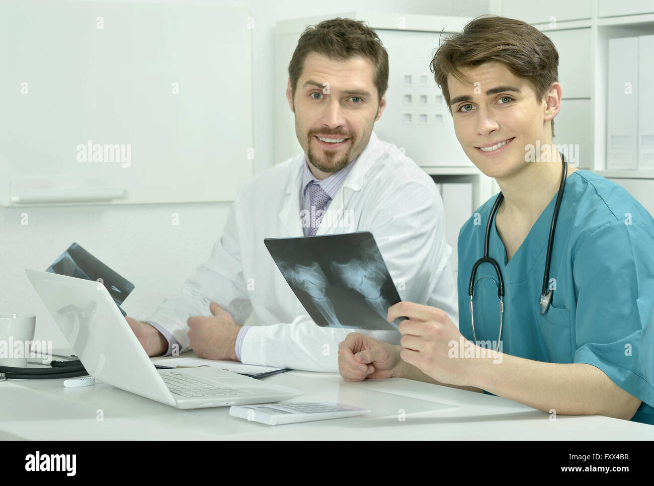 male doctors in medical office Stock Photo - Alamy
